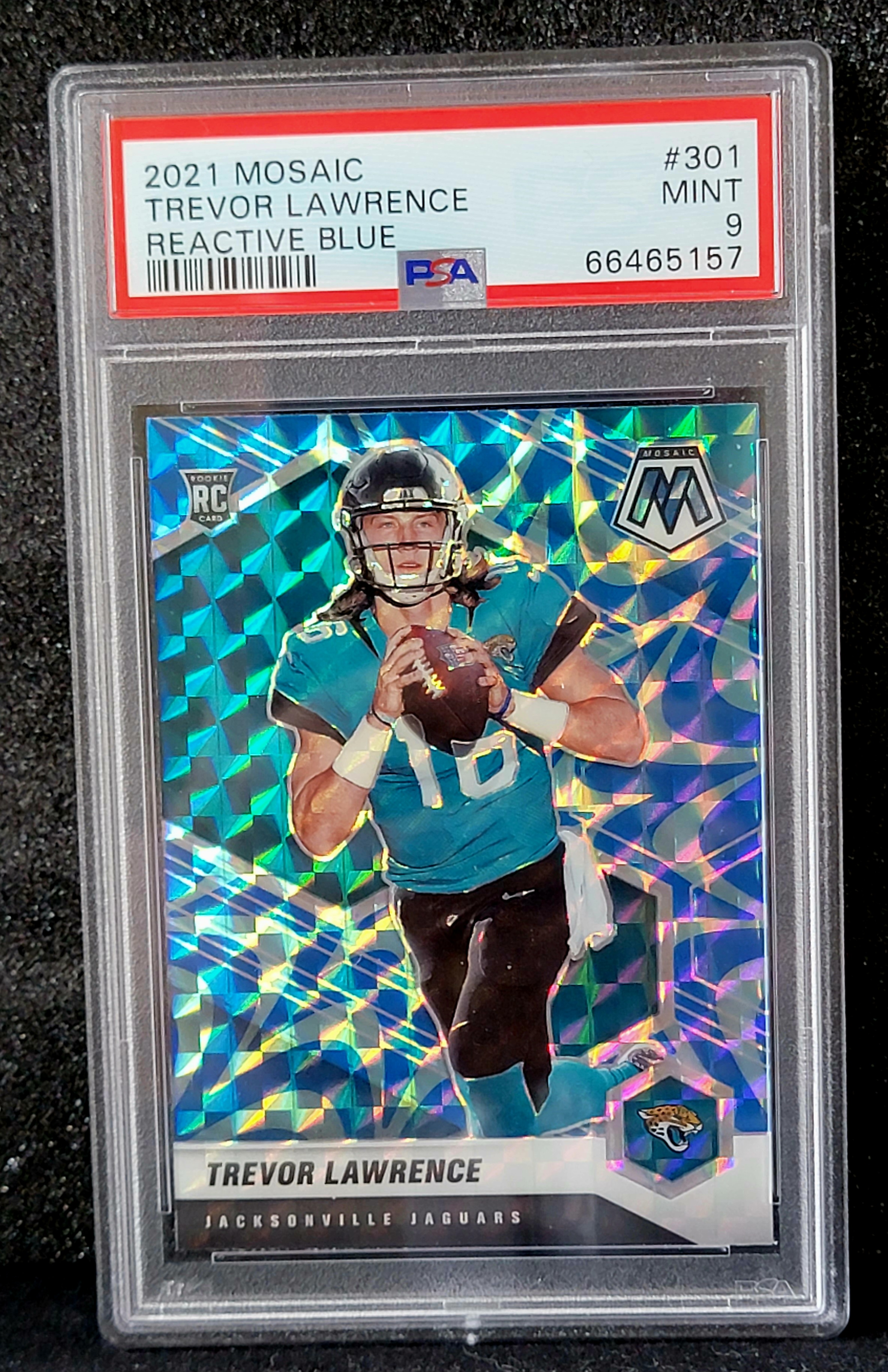 2021 Trevor Lawrence Mosaic Reactive Blue Rookie PSA Mint 9 poster
